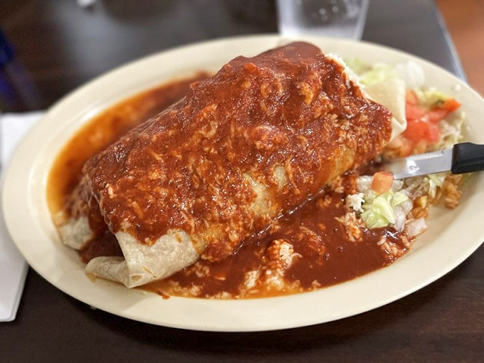 Not all heroes wear capes&mdash;some come wrapped in flour tortillas. This sauce-drenched burrito requires both hands, a stack of napkins, and absolutely zero shame.