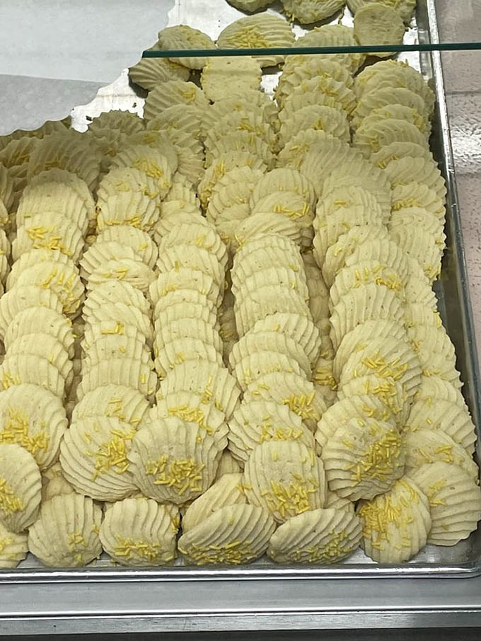 These butter cookies aren't just treats; they're little ridged works of art with sunny yellow centers that practically wink at you.