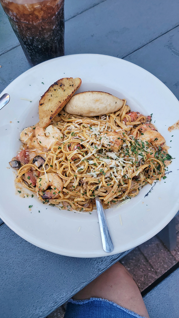 Pasta meets the sea in this twirl-worthy creation. The shrimp look like they jumped from ocean to plate just to join this party.