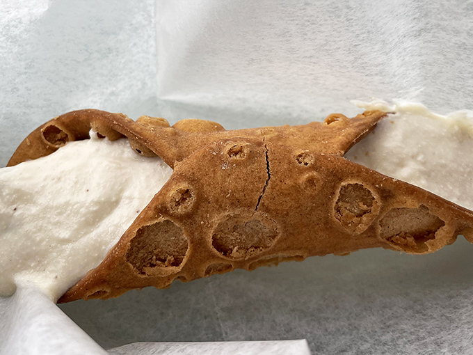 This cannoli isn't just asking to be eaten&mdash;it's practically serenading you with promises of crispy shell and creamy filling. Resistance is futile.