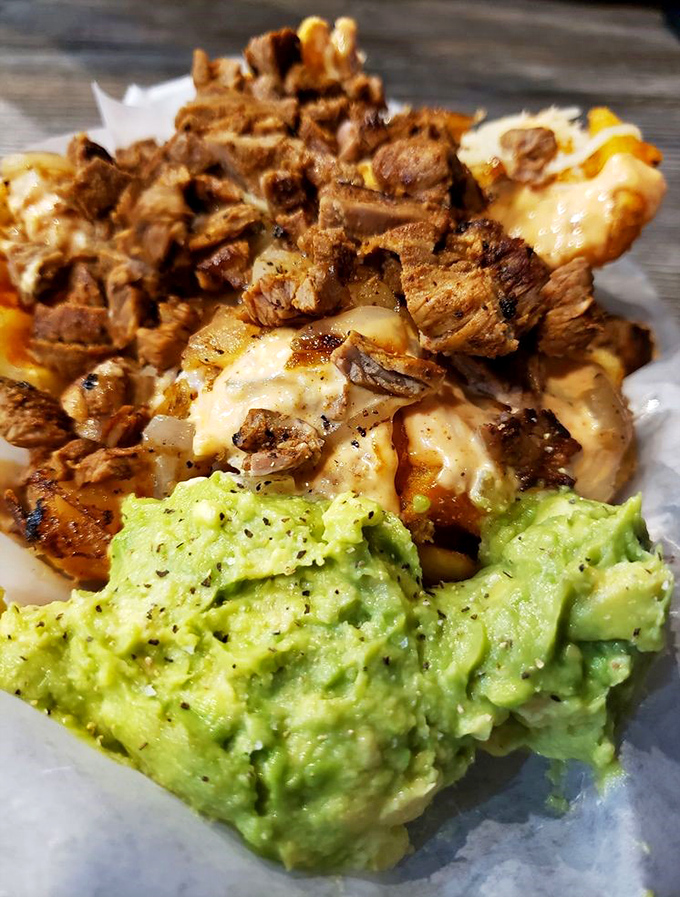 Carne asada fries: where potatoes fulfill their highest calling by becoming a vehicle for meat, cheese, and guacamole.