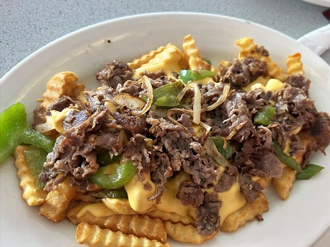 Cheese fries elevated to an art form&mdash;where crispy meets gooey meets savory in a dance of deliciousness that defies all diet plans.