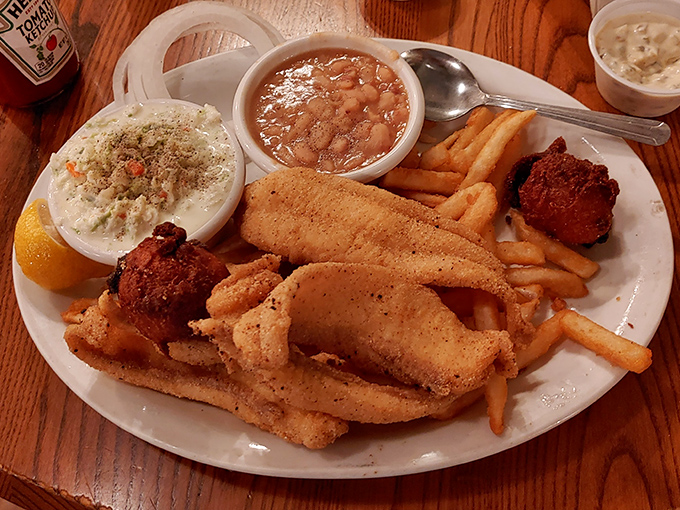 This isn't just catfish&mdash;it's a Tennessee swimming lesson. Crispy cornmeal exterior, flaky interior, and sides that demand equal attention from your fork.