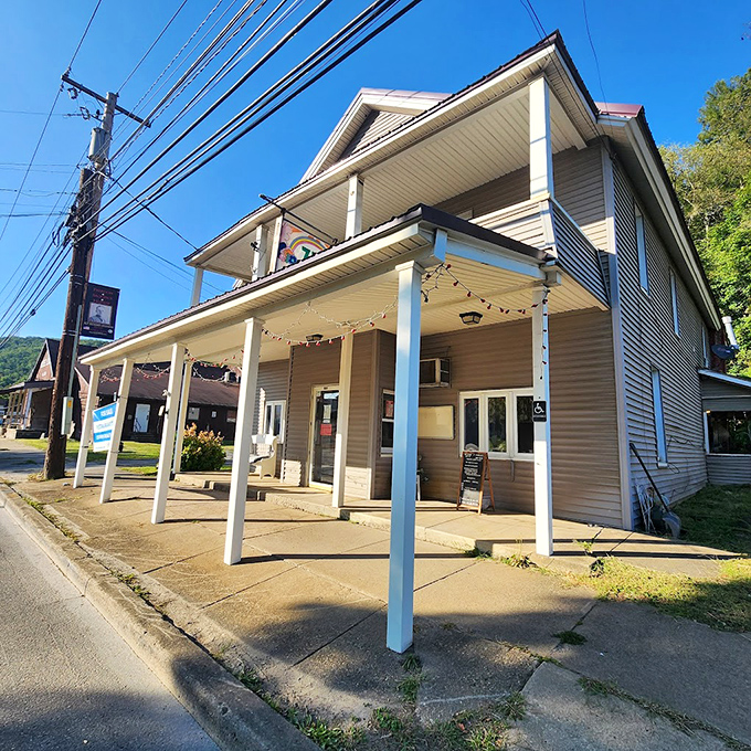 Classic front porches like this aren't architectural features&mdash;they're Emporium's social network where news travels faster than any Wi-Fi signal.