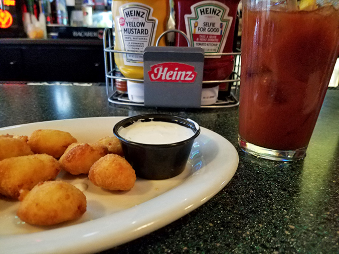 Golden cheese curds that squeak with Wisconsin pride and melt hearts faster than a summer day.