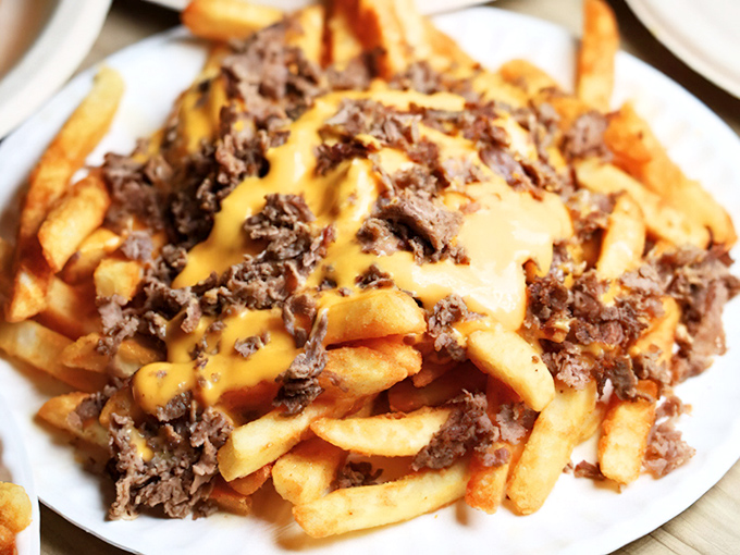 Cheese fries that answer the eternal question: "What if potatoes achieved their highest purpose in life?" This is it.