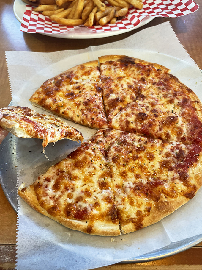 Pizza that doesn't pretend to be anything but exactly what you want&mdash;cheese melted to golden perfection on a crust that means business.