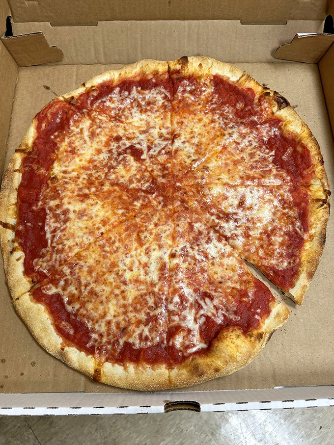 The classic cheese pizza&mdash;the benchmark of any great pizzeria. That perfect ratio of sauce to cheese with a crust that's neither too thick nor too thin.