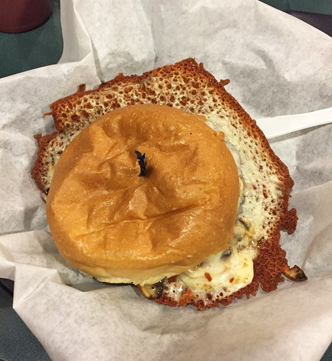 The legendary cheese skirt&mdash;where dairy meets art. Like a crispy, golden halo that transforms an ordinary burger into something worth crossing county lines for.