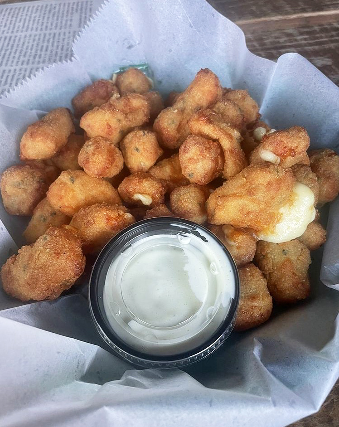 These cheese curds aren't just fried&mdash;they're transformed. Each bite delivers a symphony of crispy exterior giving way to molten, stretchy cheese heaven.