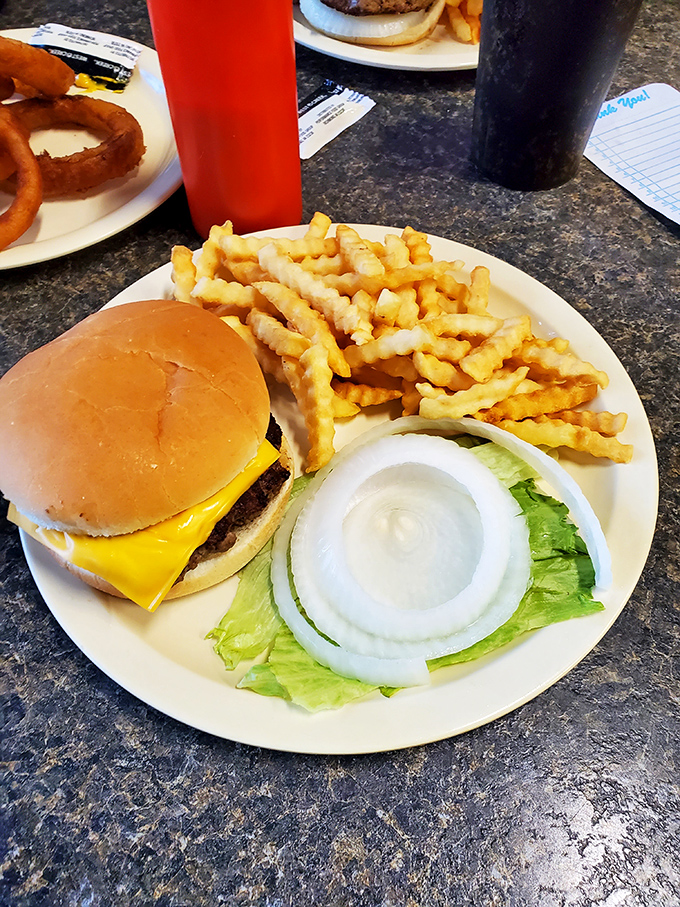 The classic cheeseburger and crinkle-cut fries combo proves Mary Lou's isn't just a one-hit breakfast wonder. Simple food done right never goes out of style.
