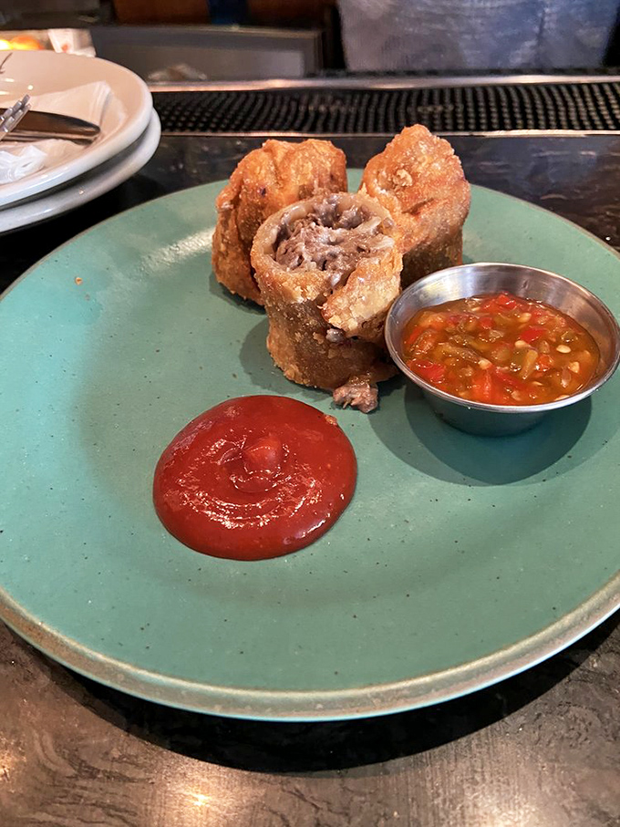 Philly's beloved cheesesteak, reimagined as crispy egg rolls with dipping sauces. Local tradition meets global inspiration in one perfect bite.