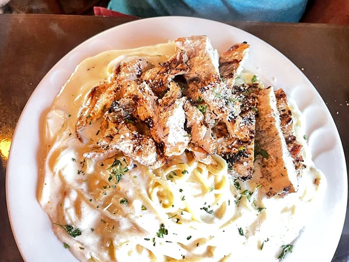 Fettuccine Alfredo that puts chain restaurants to shame &ndash; silky pasta embraced by a creamy sauce with grilled chicken that's actually seasoned properly. Revolutionary concept!