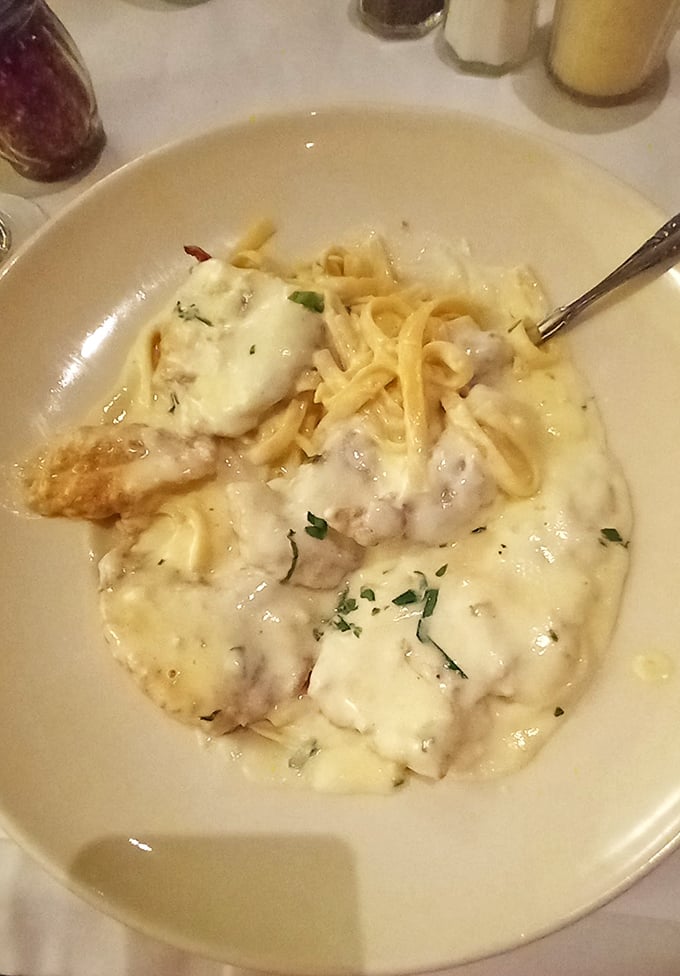 This chicken Alfredo isn't just comfort food—it's therapy in a bowl. The kind of creamy indulgence that makes you forget about your diet until tomorrow.