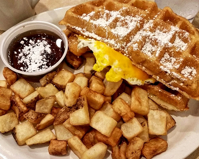 The chicken and waffle situation here isn't just breakfast &ndash; it's architecture, sculpture, and poetry, dusted with powdered sugar for good measure. 