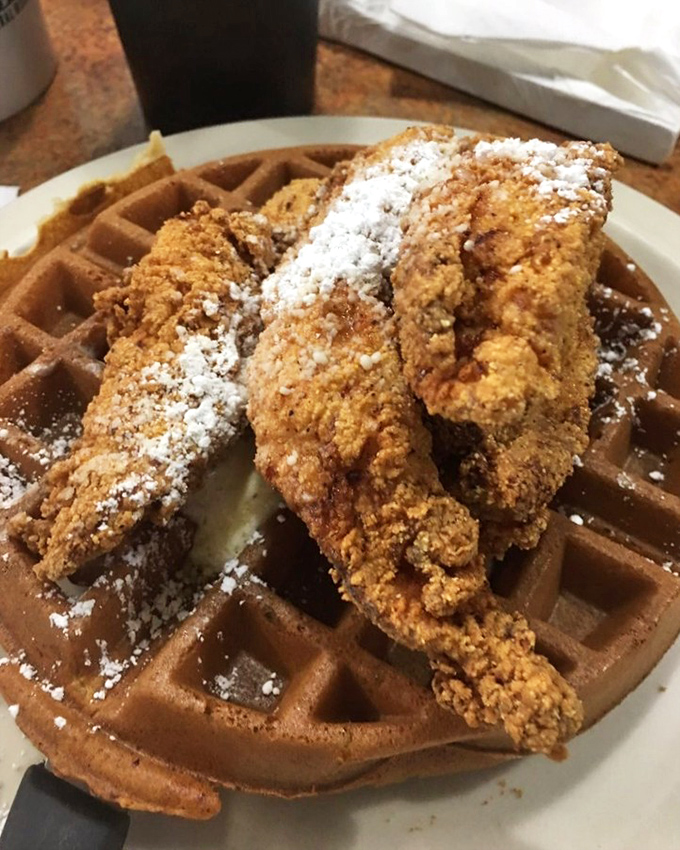 Chicken and waffles: where breakfast meets dinner and decides to throw a party. That powdered sugar dusting? The confetti.
