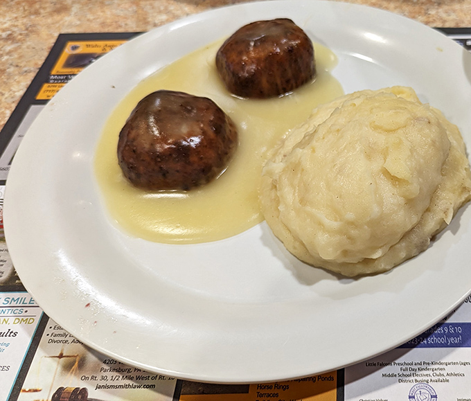 These meatballs aren't just sitting in sauce&mdash;they're luxuriating in it, like tiny meat islands in a golden gravy sea.