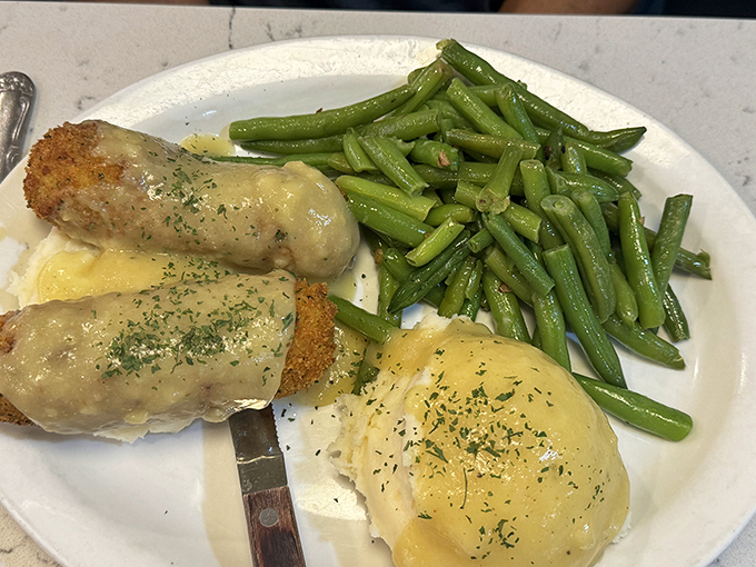 Comfort food alert! These chicken croquettes with creamy gravy remind you why grandma's recipes will always trump trendy food fads.