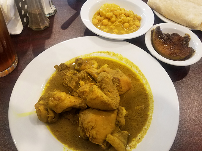 This curry chicken isn't just yellow &ndash; it's liquid sunshine. The sauce demands to be soaked up with every last grain of rice.