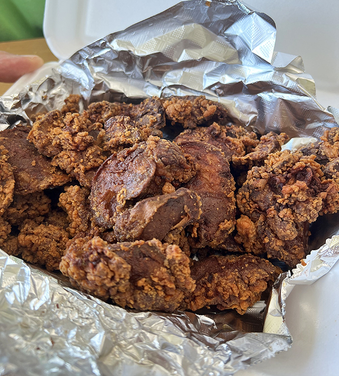 These crispy chicken livers wrapped in foil might not win beauty contests, but they'll win your heart with first-bite crunch.