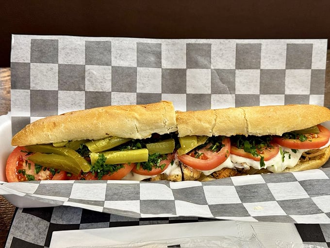The Chicken Maroosh isn't just a sandwich; it's a masterclass in how pickles, tomatoes, and garlic sauce can elevate poultry to poetry.