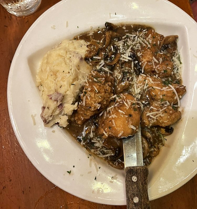 Chicken Marsala so tender it practically melts before reaching your fork, like culinary magic in motion.