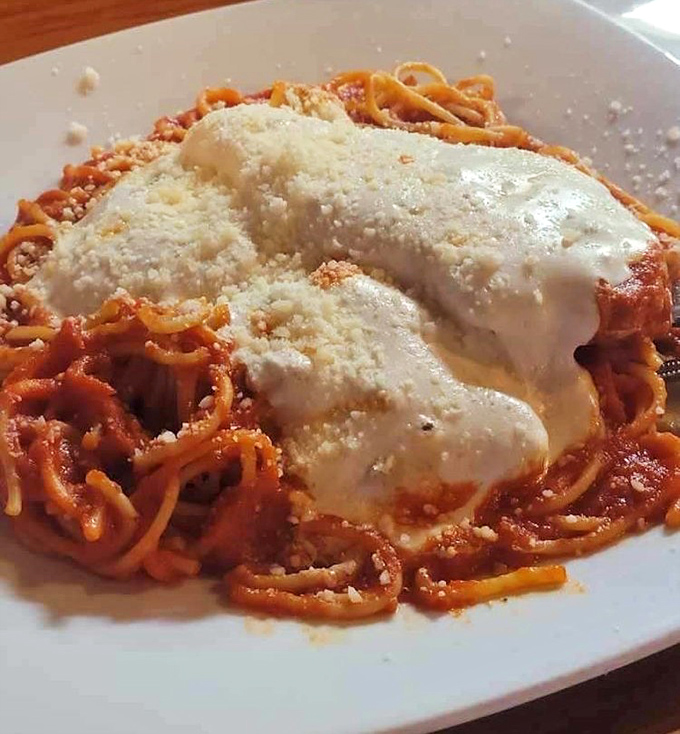 Chicken Parmigiana that would make your Italian grandmother weep with joy&mdash;if she could see past the mountain of melted cheese.