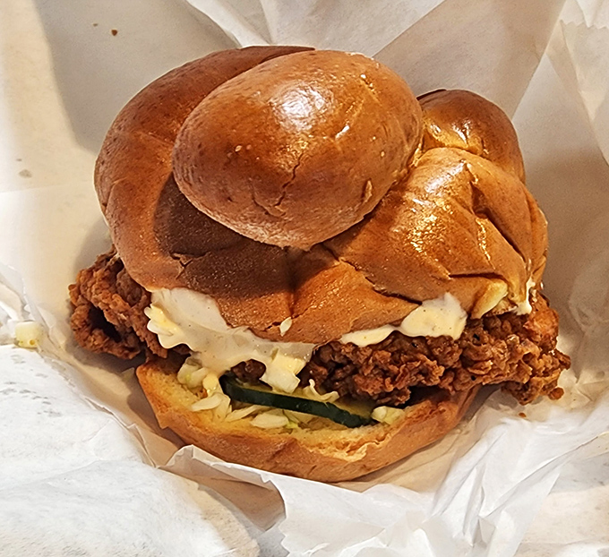 The Lincoln Park chicken schnitzel sandwich &ndash; a golden-brown masterpiece on a challah roll. Proof that sometimes the best things in life come between two pieces of bread.