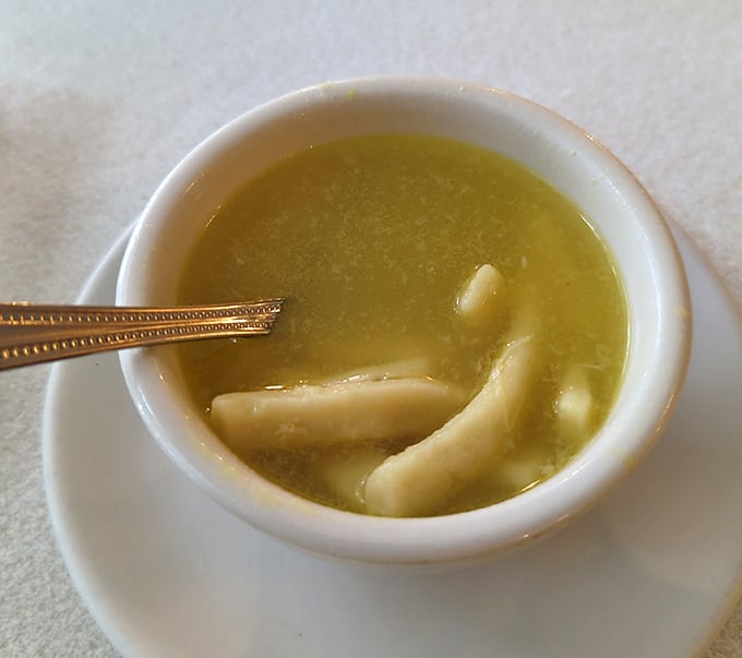 Clear broth, tender noodles&mdash;this unassuming soup is the opening act that somehow manages to steal part of the show. Liquid comfort in a cup.