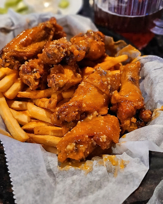 These wings aren't just good—they're "text your friends immediately" good. Glistening with sauce and begging to be devoured.