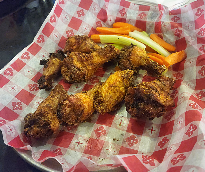 Wings that don't just fly &ndash; they soar. Crispy, seasoned perfection served with veggies that pretend you're making healthy choices.