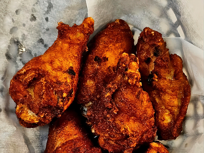 These wings aren't trying to win a beauty contest, but they're definitely winning the flavor Olympics with that perfect crispy exterior.