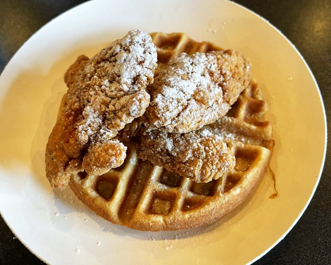 Crispy chicken meets fluffy waffle in a sweet-savory romance that would make Shakespeare write a sonnet instead of a tragedy.