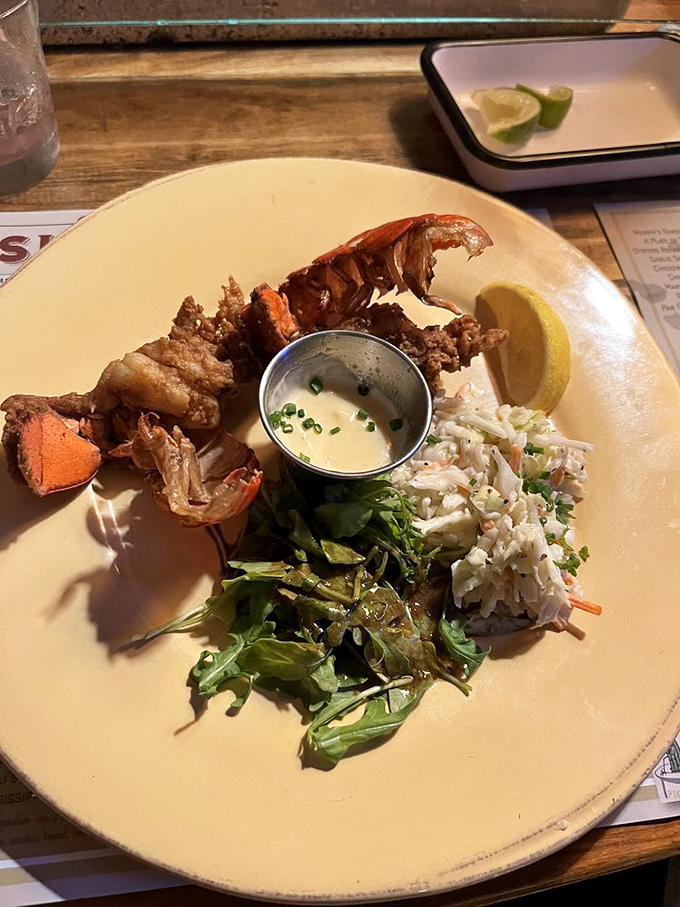 Lobster tail gets the Southern treatment—chicken-fried to crispy perfection with slaw that cuts through the richness like a charm.