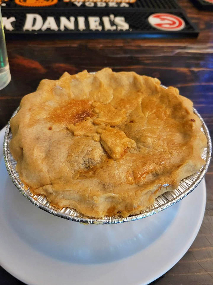 Behold the chicken pot pie in all its glory – the crust puffed and bronzed like it just won Star Baker on The Great British Bake Off.