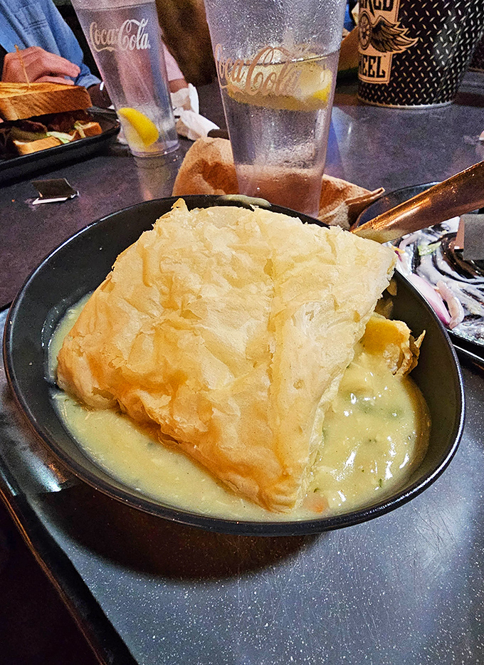 The legendary chicken pot pie in all its glory. That flaky crust is the gateway to comfort food nirvana.