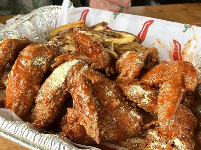 These wings aren't just cooked, they're transformed. The dusting of seasoning is like fairy dust for your taste buds.
