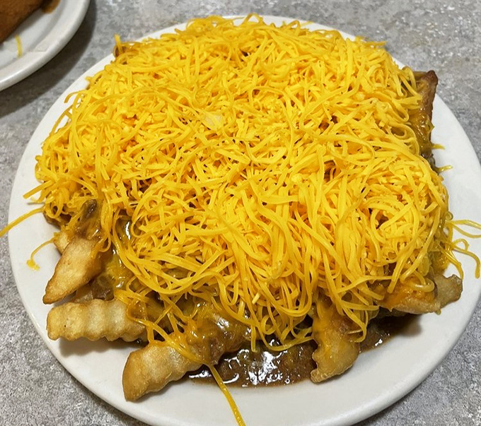 These cheese-smothered fries could broker world peace if given half a chance.