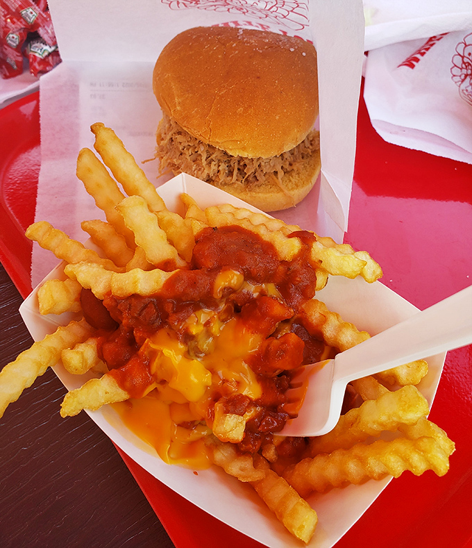 Chili cheese fries that laugh in the face of diet plans&mdash;a glorious mess of crispy, cheesy, meaty goodness that demands both fork and fingers.