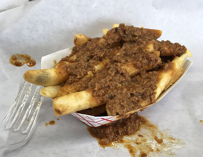 Chili cheese fries: where dignity goes to die and happiness comes to live. Fork optional, napkins mandatory.