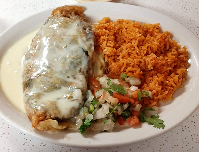 The chile relleno – a crispy, cheese-blanketed masterpiece that makes you wonder why you'd ever order anything else.