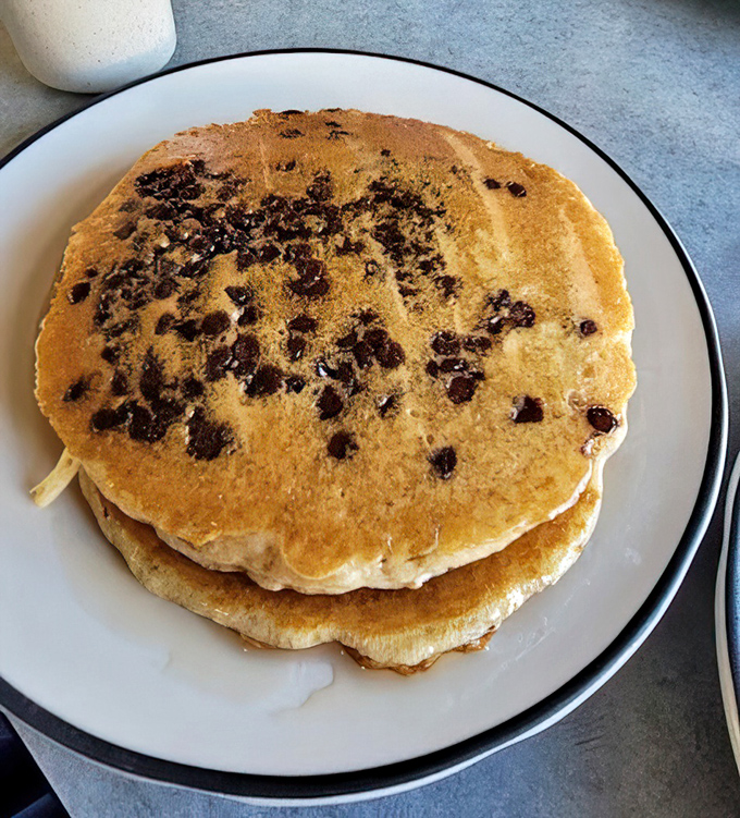 Chocolate chip pancakes that make you question why we don't eat dessert for breakfast more often. Fluffy, golden, and studded with melty goodness.