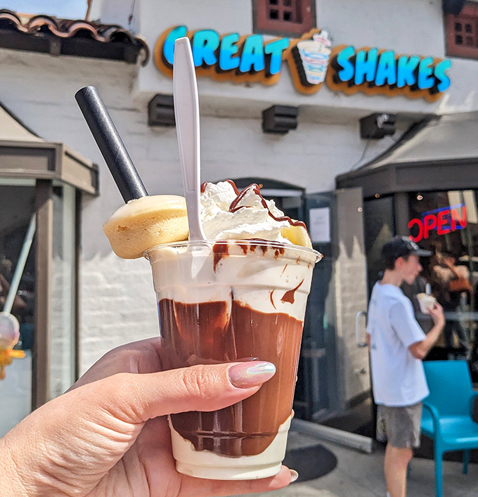 This chocolate shake looks thick enough to stand a spoon in &ndash; the kind that makes straws work for their paycheck.