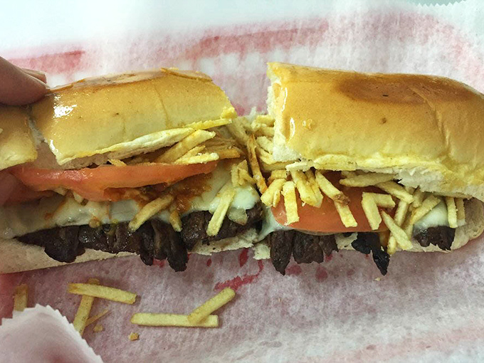 The Churrasco sandwich arrives like a delicious challenge: "Go ahead, try to eat me gracefully."