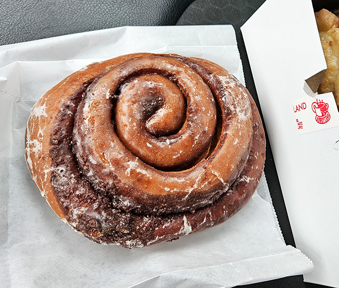 This cinnamon roll isn't just breakfast, it's an event. The perfect spiral makes mathematicians and sweet tooths equally satisfied.