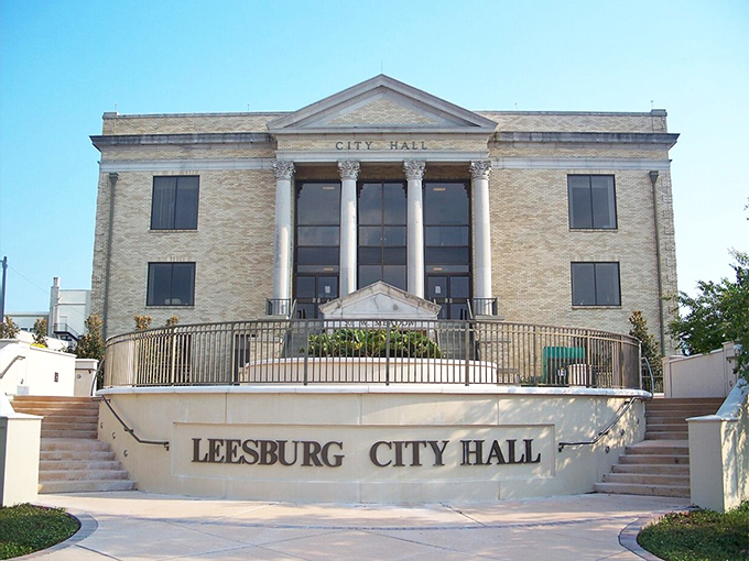 Leesburg City Hall looks like it's auditioning for a role in a small-town legal drama. Those columns mean business, but the Florida sky keeps things casual.
