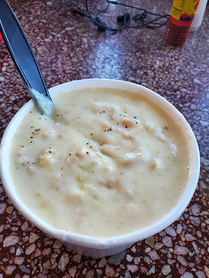 Clam chowder that doesn't hide behind fancy garnishes &ndash; just honest, creamy goodness with plenty of clams. The kind that makes you forget your table manners.