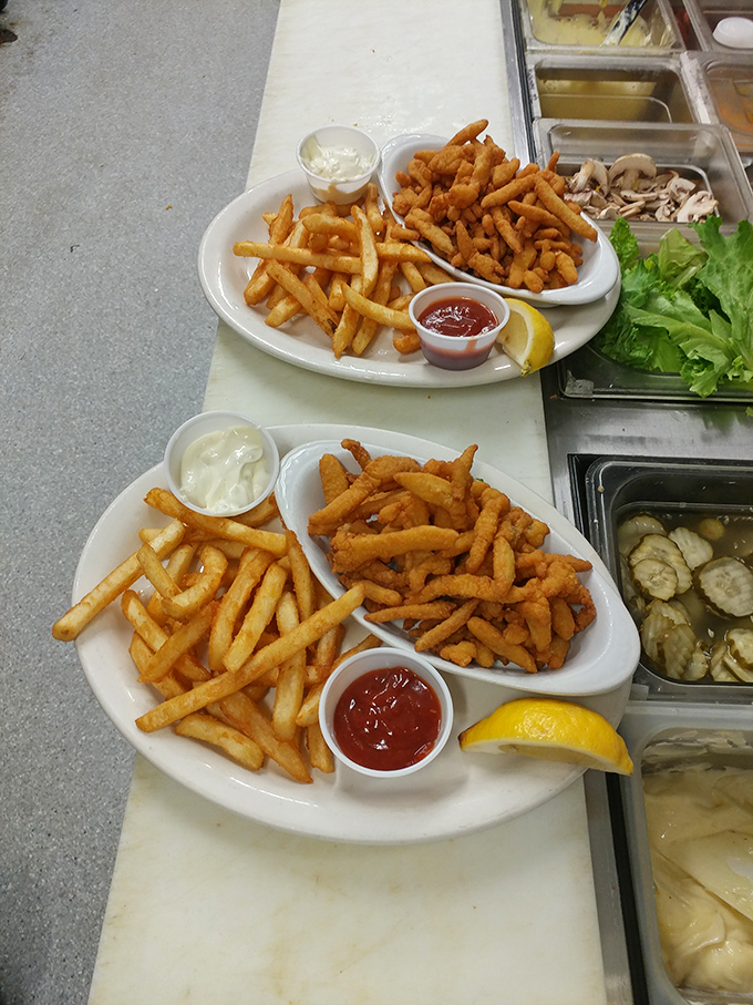 Golden clam strips and crispy fries&mdash;the kind of seafood platter that makes you wonder why you ever eat anything else at the coast.