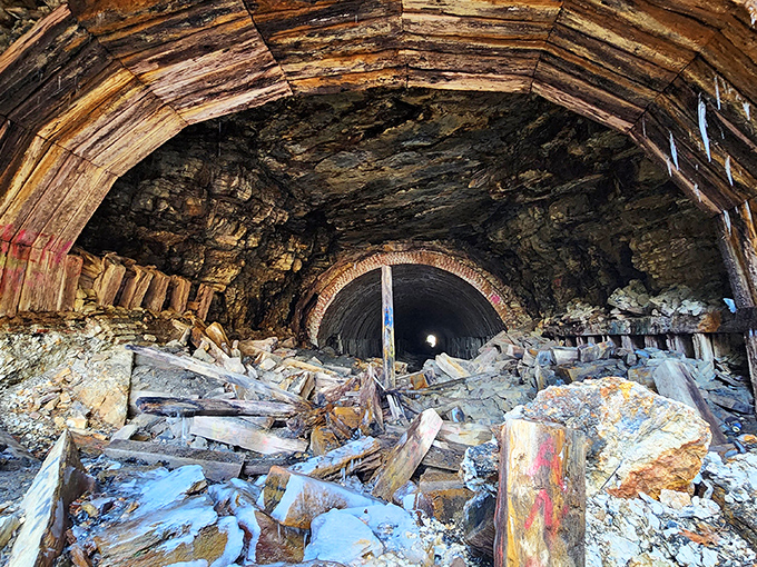 The abandoned Clarion Trestle tunnel stands as a rugged monument to industrial history, its weathered walls whispering stories of Pennsylvania's railroad glory days.