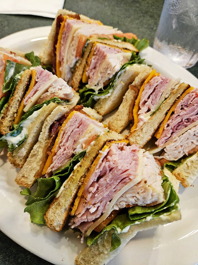 This club sandwich isn't playing around&mdash;it's layered like a perfect geological formation of deliciousness. Archeologists of hunger, take note.
